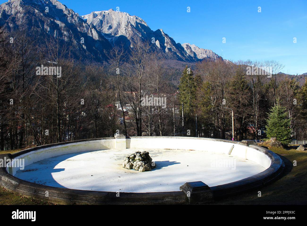 Sunny winter landscape with Bucegi mountains and Busteni ski resort in ...