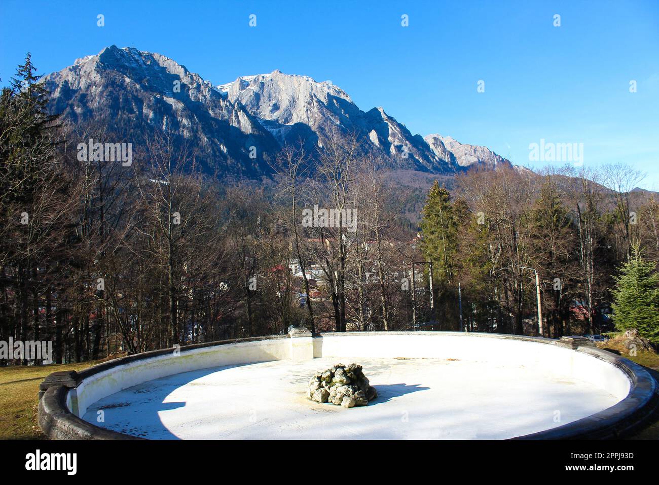Sunny winter landscape with Bucegi mountains and Busteni ski resort in ...
