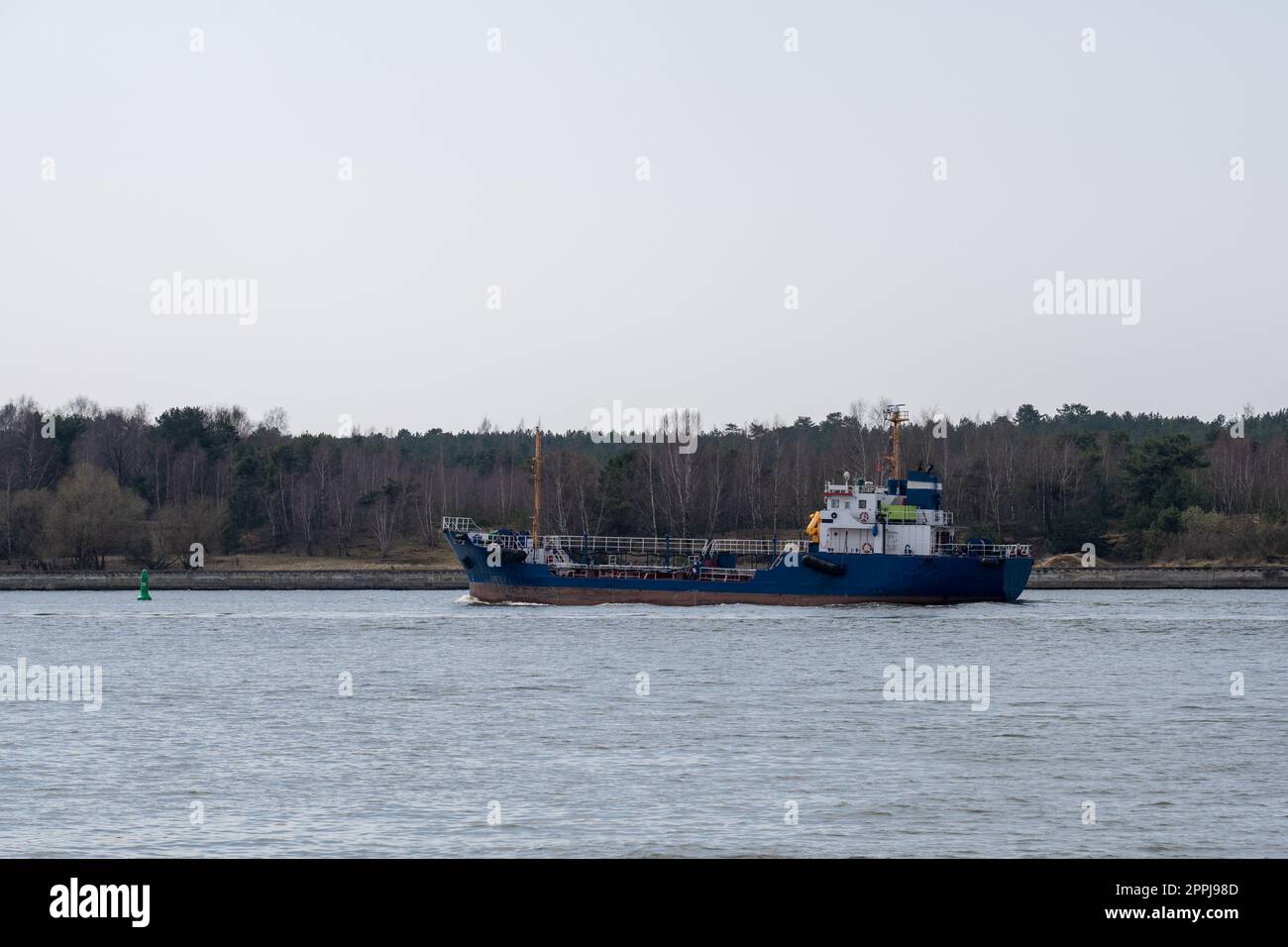 Small blue ship Stock Photo - Alamy
