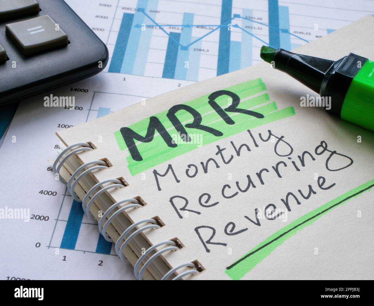 Page with marks about MRR Monthly Recurring Revenue Stock Photo - Alamy