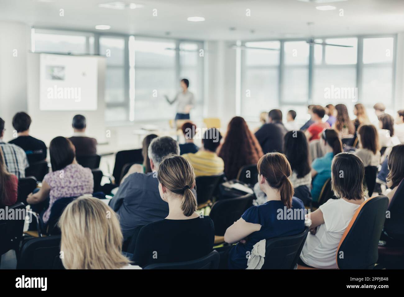 Speaker giving presentation on business conference Stock Photo - Alamy