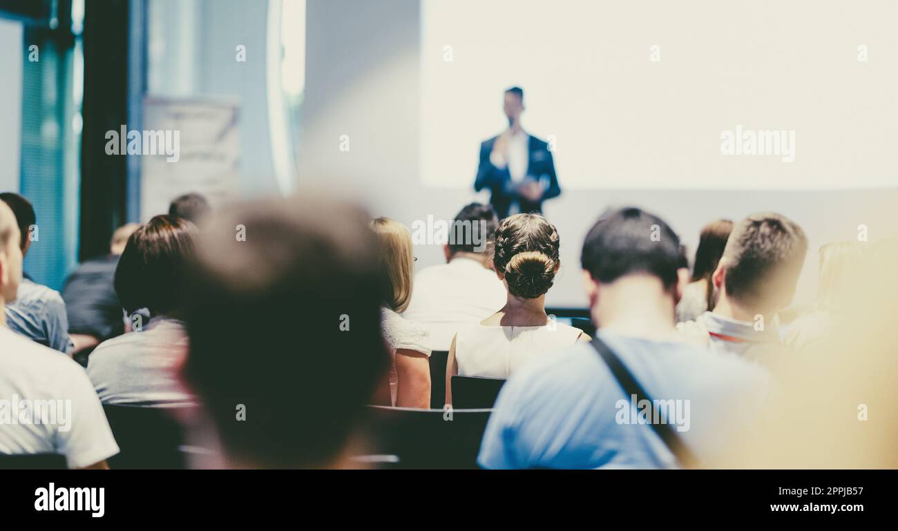 Male business speaker giving a talk at business conference event Stock ...