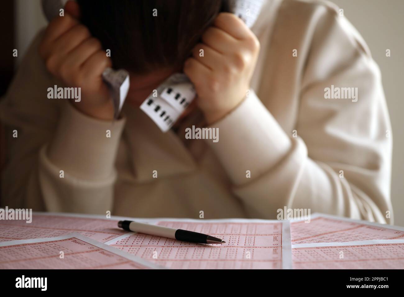 Sad person lottery ticket hi-res stock photography and images - Alamy
