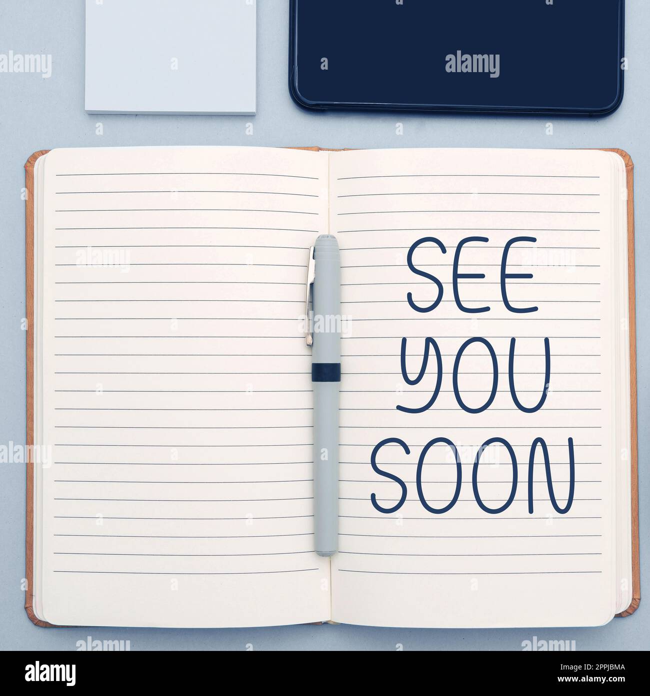 Sign displaying See You Soon. Conceptual photo used for saying goodbye ...