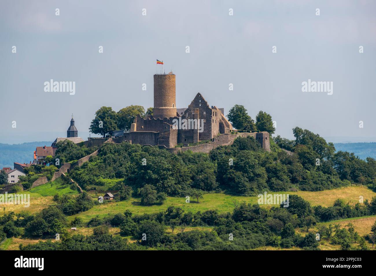 The ruins of the hilltop castle Gleiberg with keep, palace, church and ...