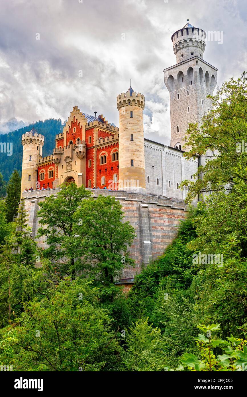 Front view of the faÃ§ade of Neuschwanstein Castle with entrance area ...