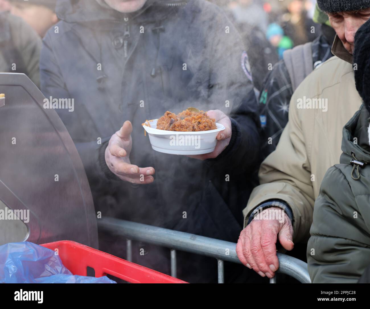 Warm food for the poor and homeless Stock Photo - Alamy
