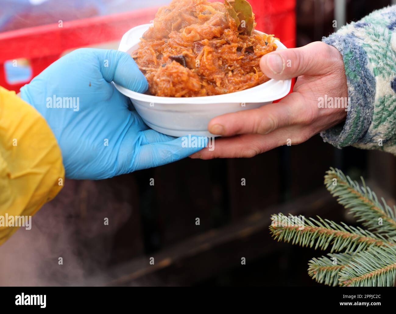 Warm food for the poor and homeless Stock Photo - Alamy