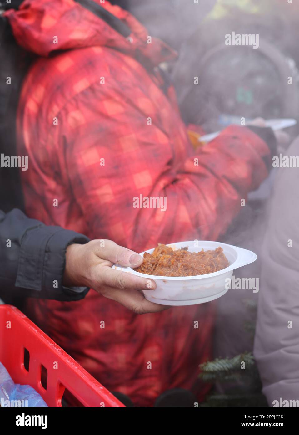 Warm food for the poor and homeless Stock Photo - Alamy