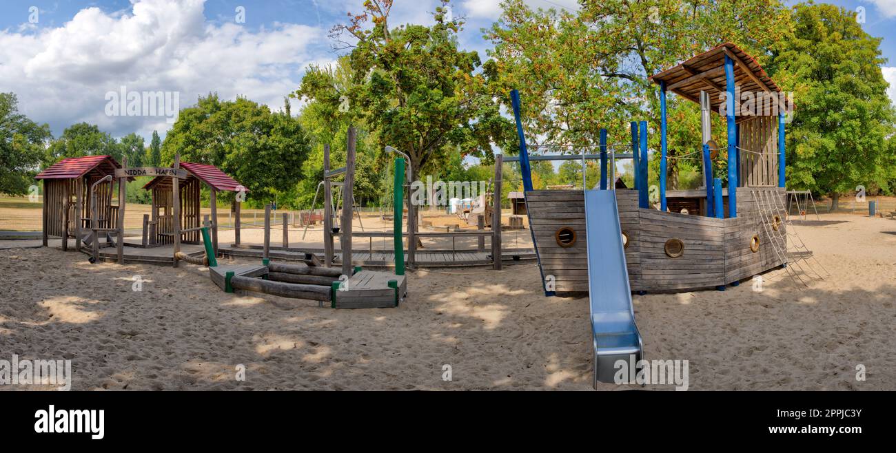 Panoramic view of playground with various climbing and playing ...