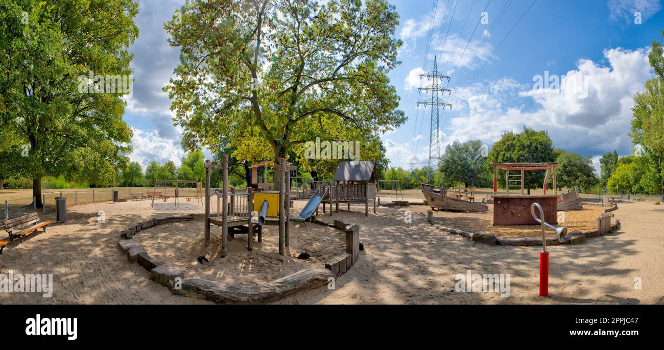 Panoramic view of playground with various climbing and playing ...