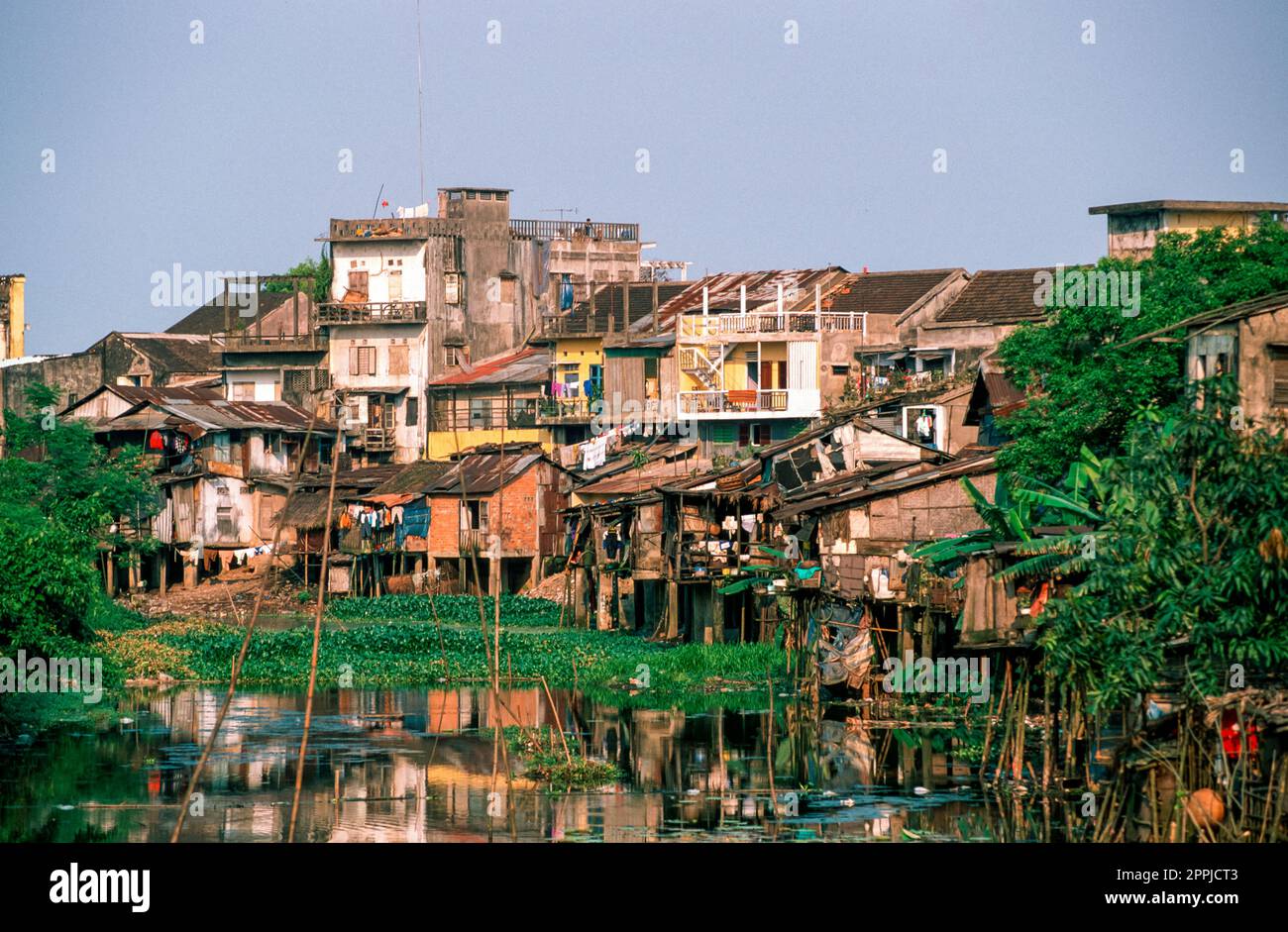 Scanned slide of historical color photograph of slum in the Old Quarter ...