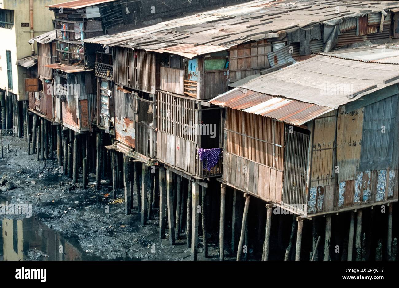 Scanned slide of historical color photograph of slum in the Old Quarter ...