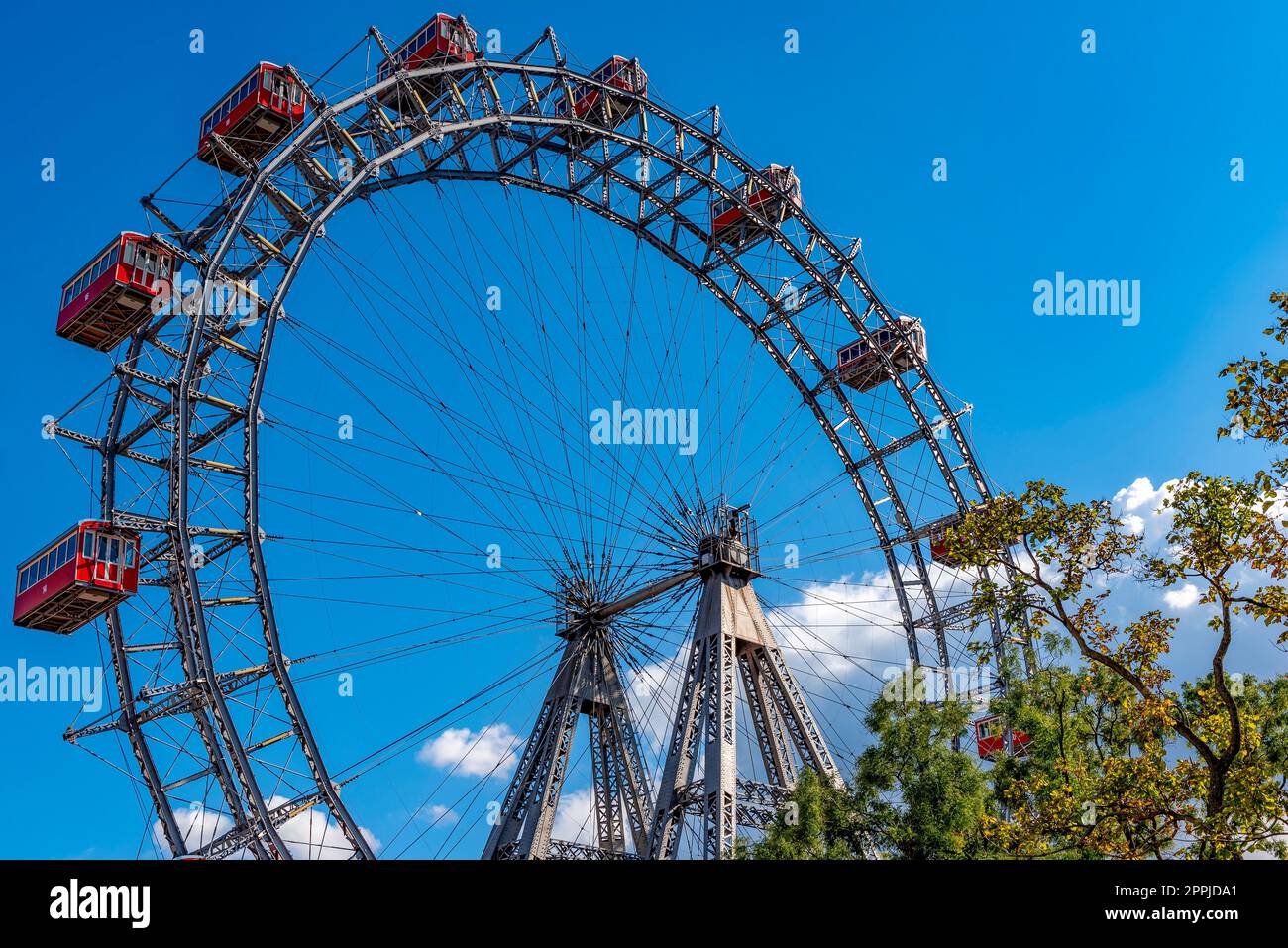 The Ferris wheel in the Vienna Prater in the frog perspective with ...