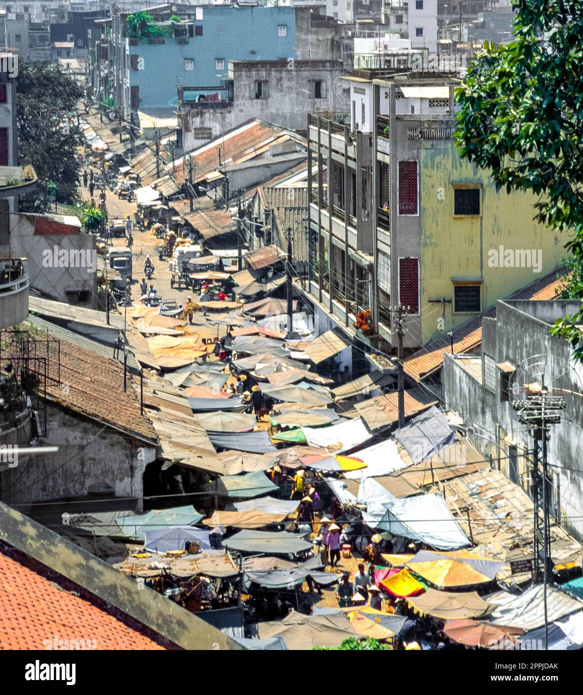 Scanned slide of historical color photograph of slum in the Old Quarter ...