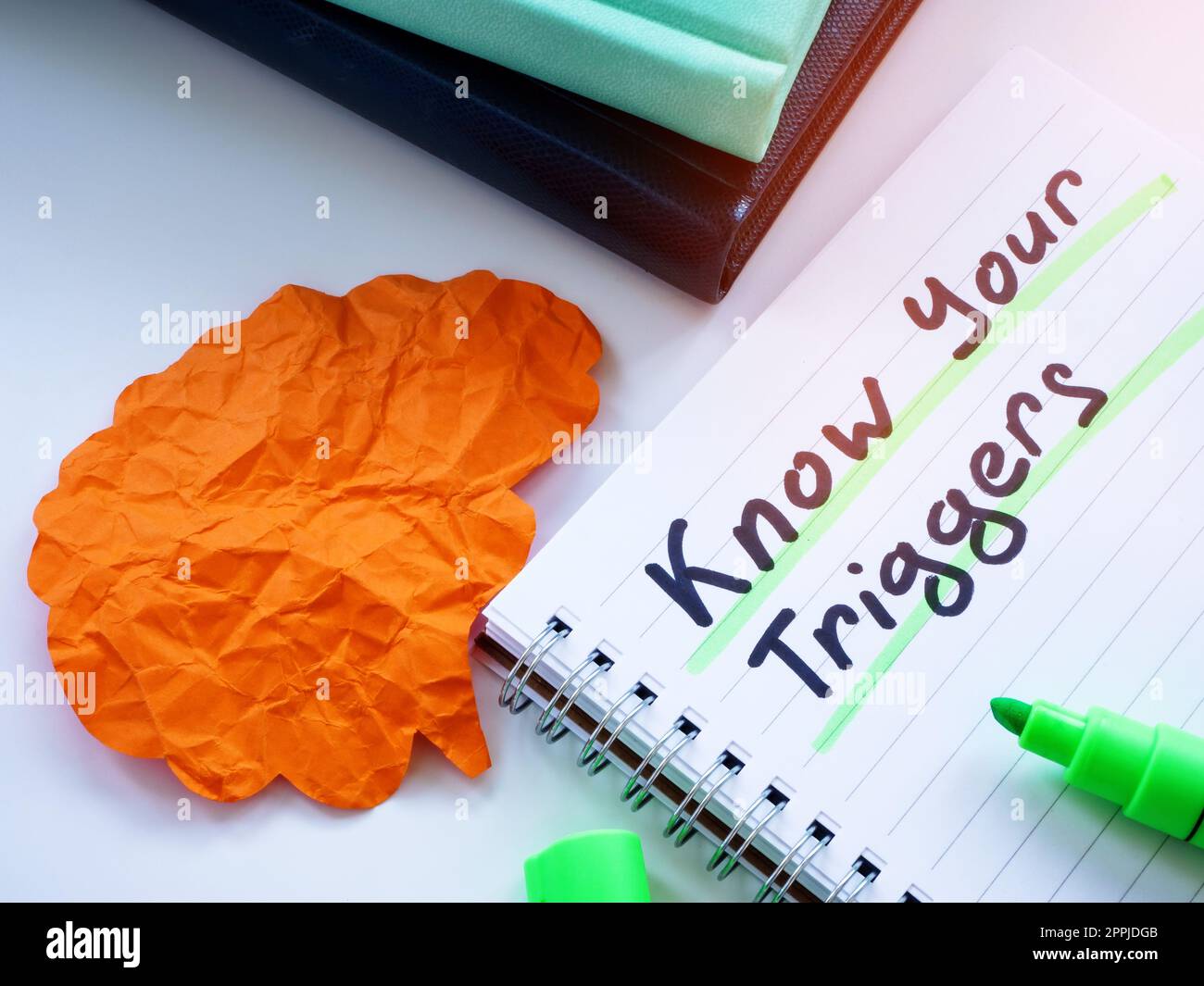 Brain from paper and inscription Know your triggers Stock Photo - Alamy