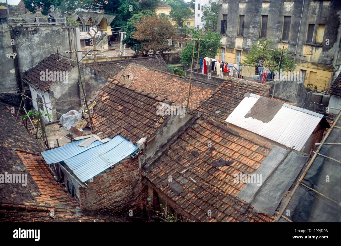 Scanned slide of historical color photograph of slum in the Old Quarter ...