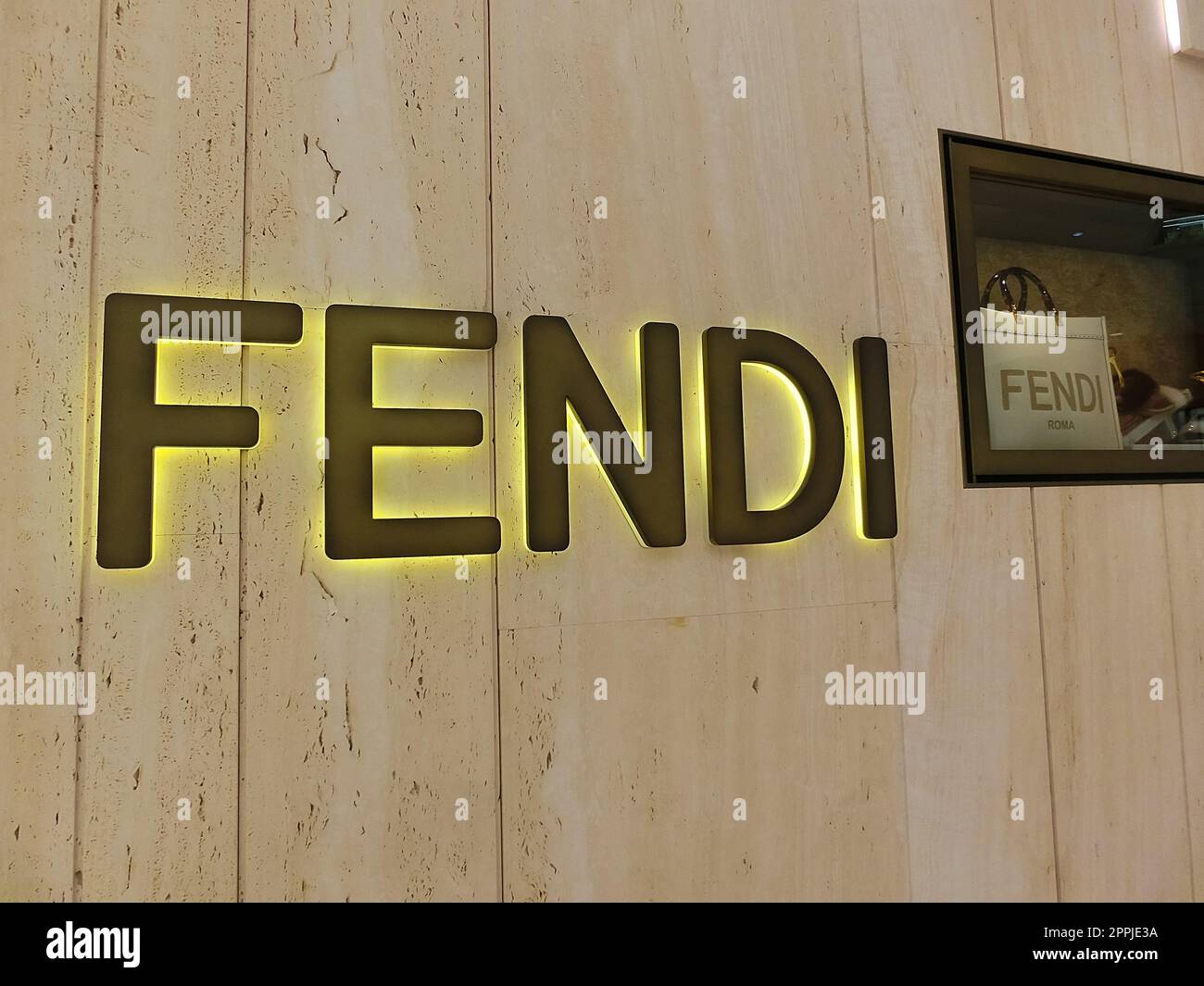 Fendi logo on the wall at Aventura Mall in Florida. Fendi is an Italian luxury fashion house ...