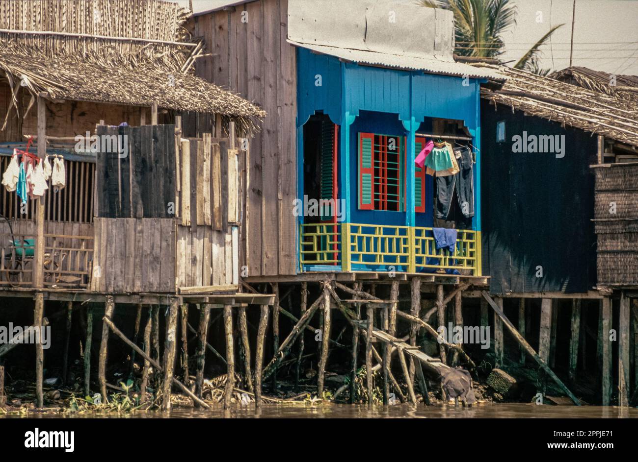 Scanned slide of historical color photograph of slum in the Old Quarter ...