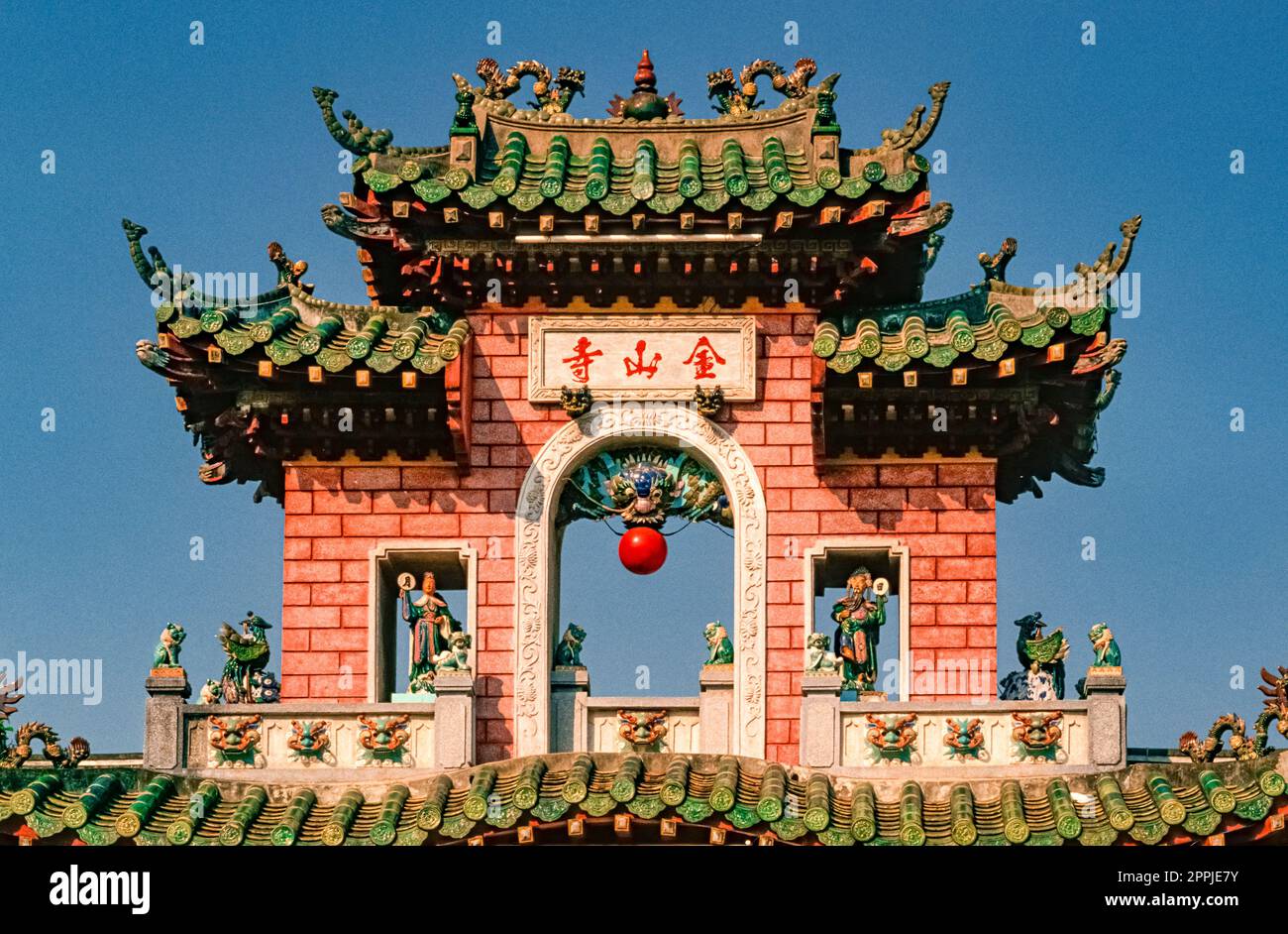 Scanned slide of a historical color photograph of the entrance portal ...