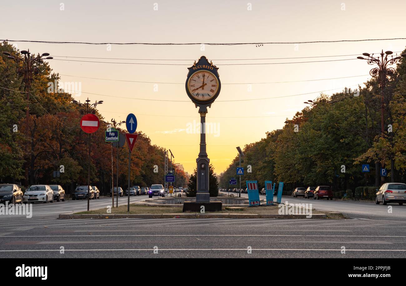Bucharest Clock at Sunrise in the Fall Stock Photo - Alamy