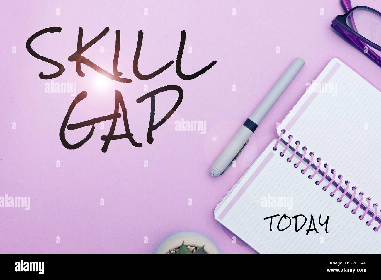 Hand writing sign Skill Gap. Business overview Refering to a person's ...