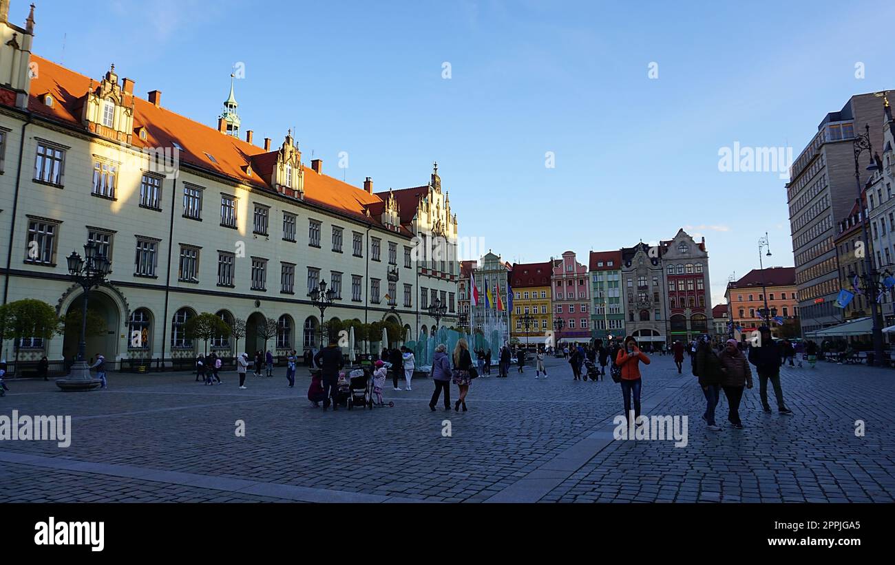 old town hall building with a clock in the center on Wroclaw Square ...