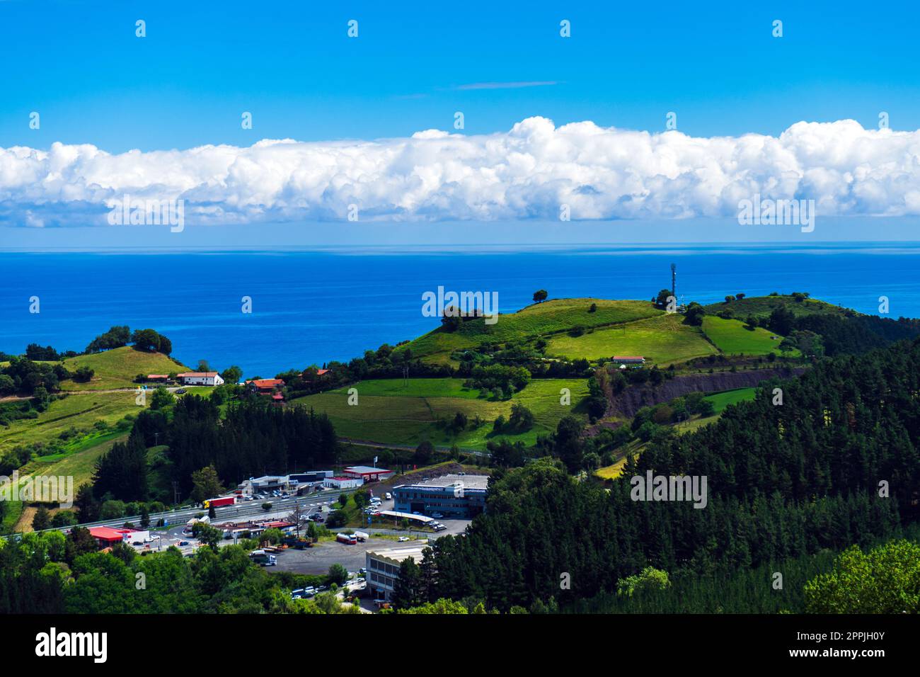Landscape overlooking the green hills and the Atlantic Ocean Stock ...