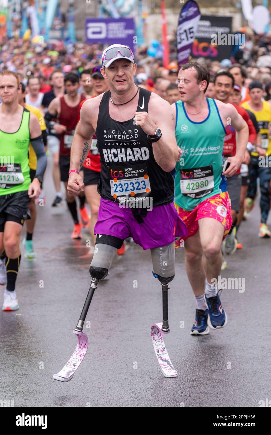 Para athlete Richard Whitehead competing in the TCS London Marathon 2023 passing through Tower ...