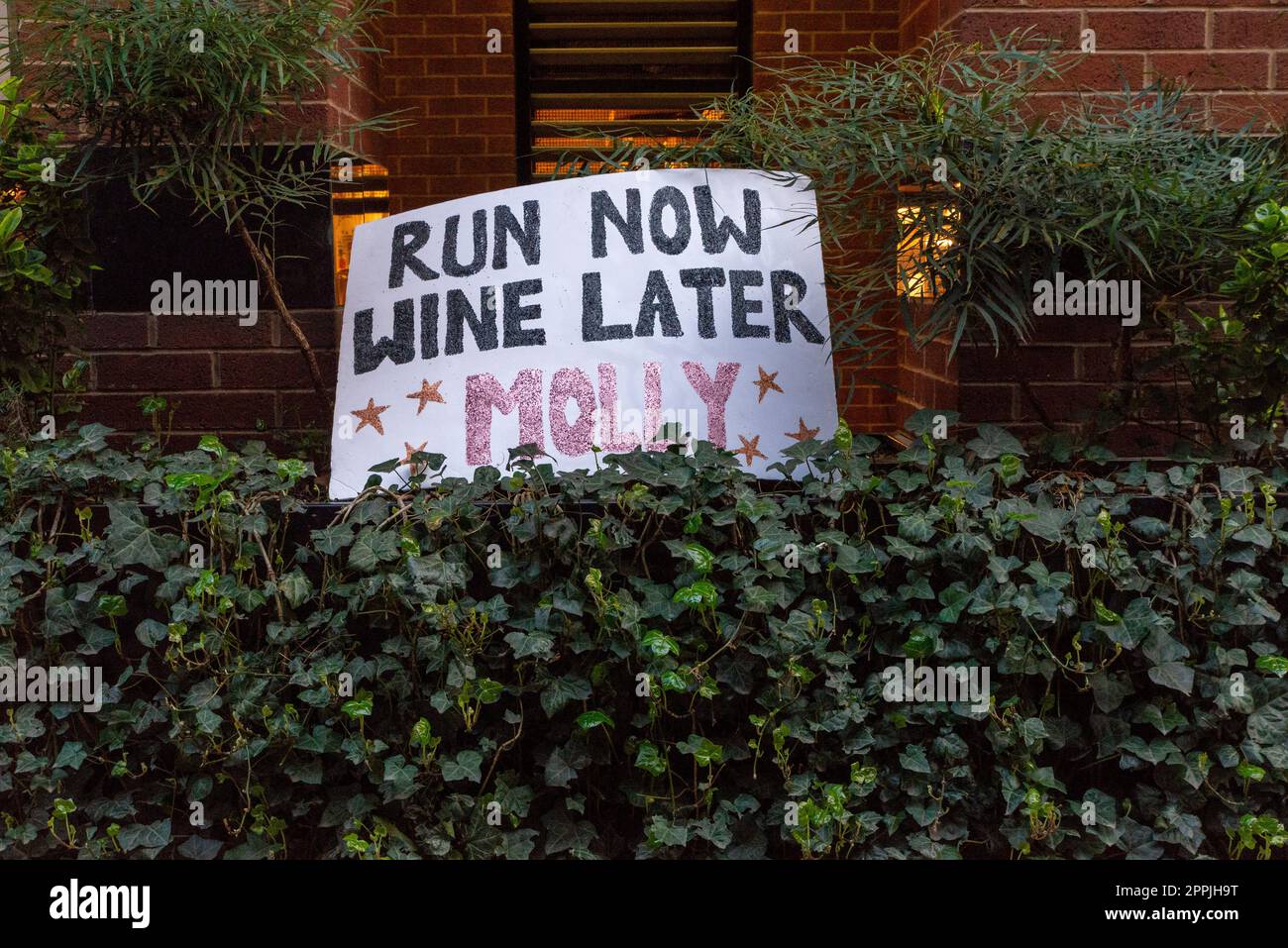 Discarded sign after the 2023 London Marathon, UK, stating: Run now ...