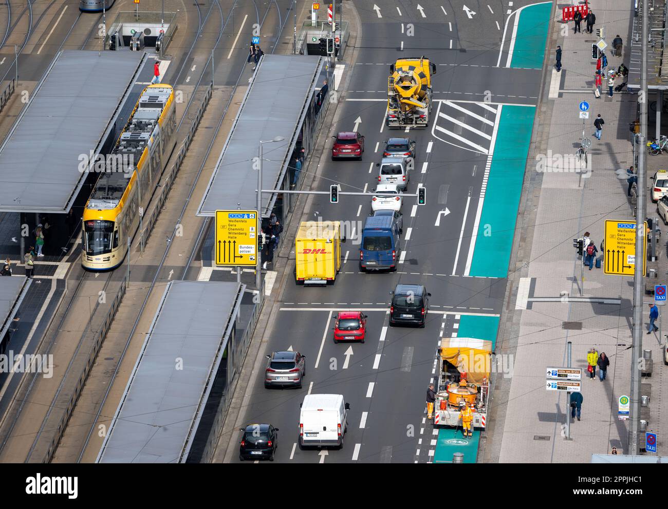 Leipzig, Germany. 24th Apr, 2023. Marking work for a new bike path is ...
