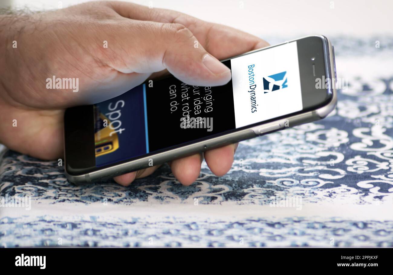 human hand scrolling Boston Dynamics website on a phone screen Stock Photo - Alamy