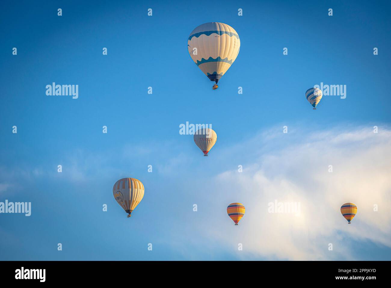 hot air balloons fly high in the Turkish sky Stock Photo - Alamy