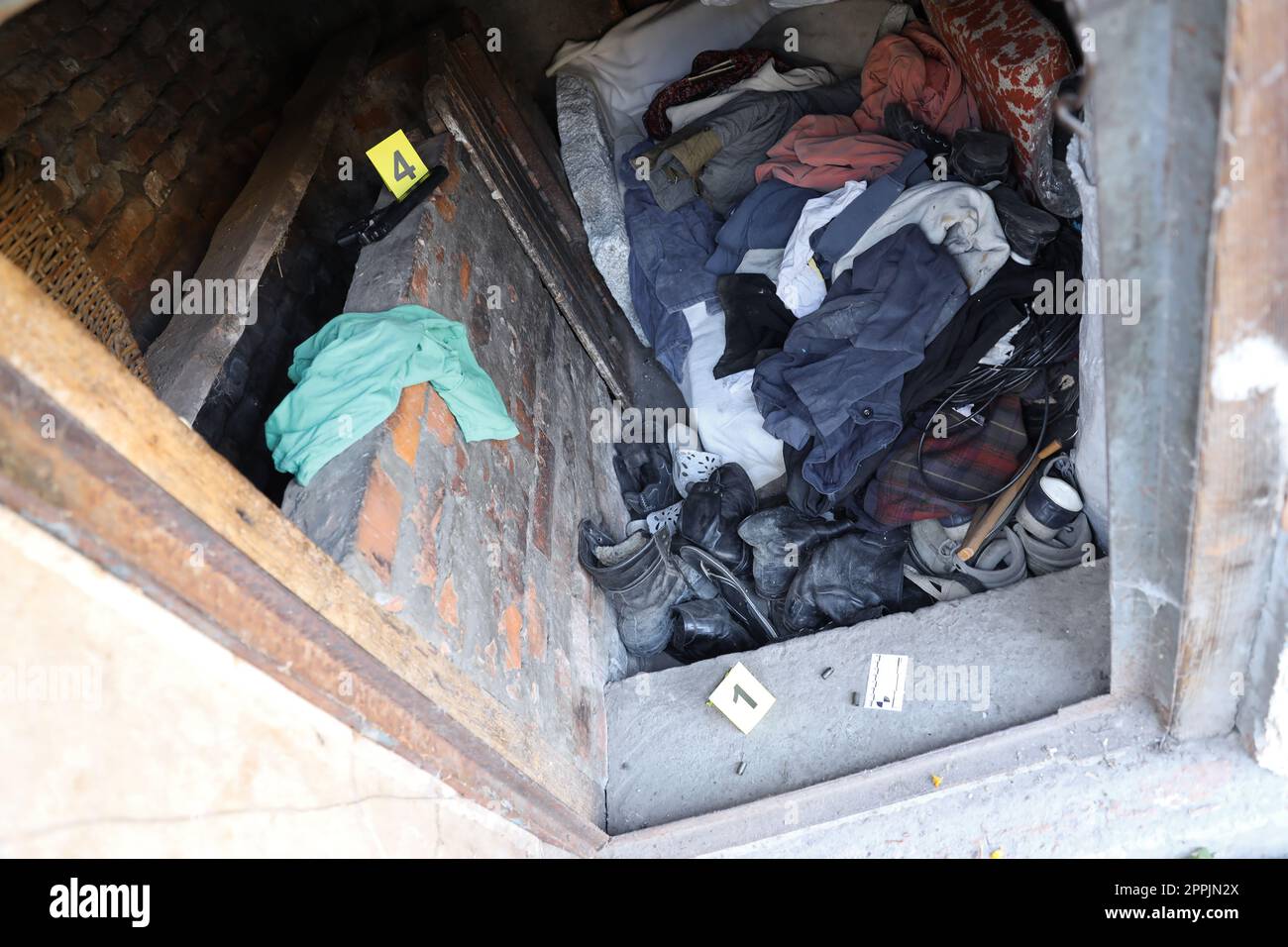 Evidence with yellow CSI marker for evidence numbering on the ...