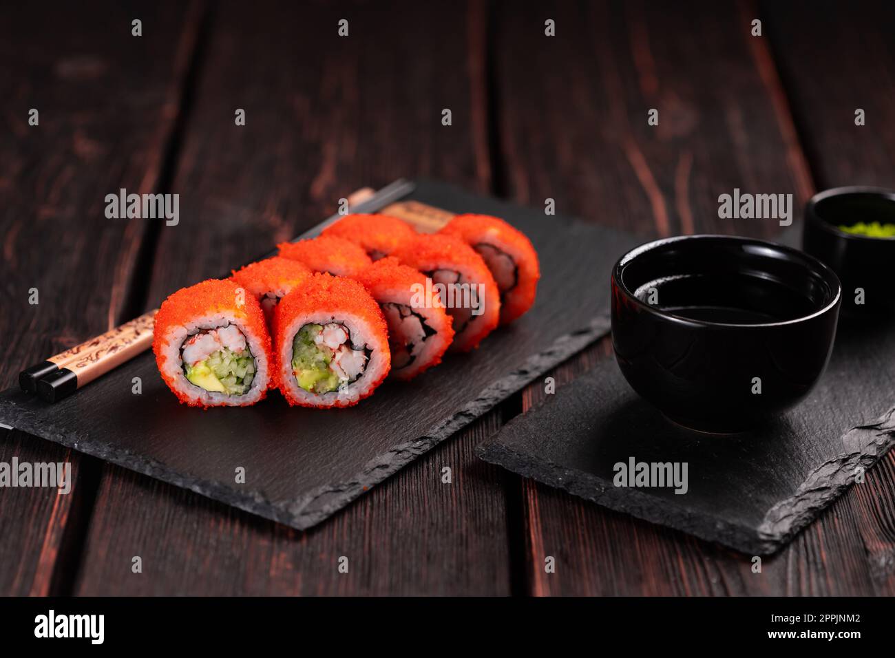 California sushi roll with crab, avocado, cucumber and tobiko caviar ...