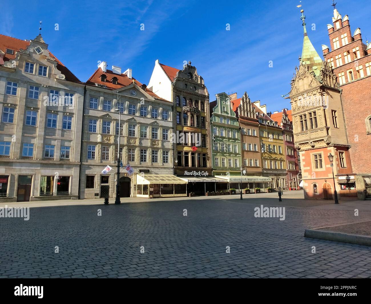 old town hall building with a clock in the center on Wroclaw Square ...