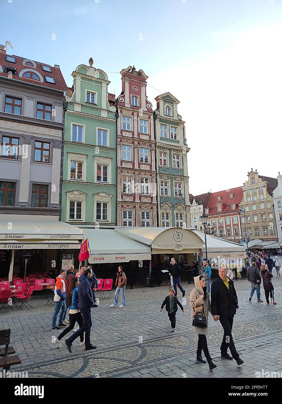 old town hall building with a clock in the center on Wroclaw Square ...