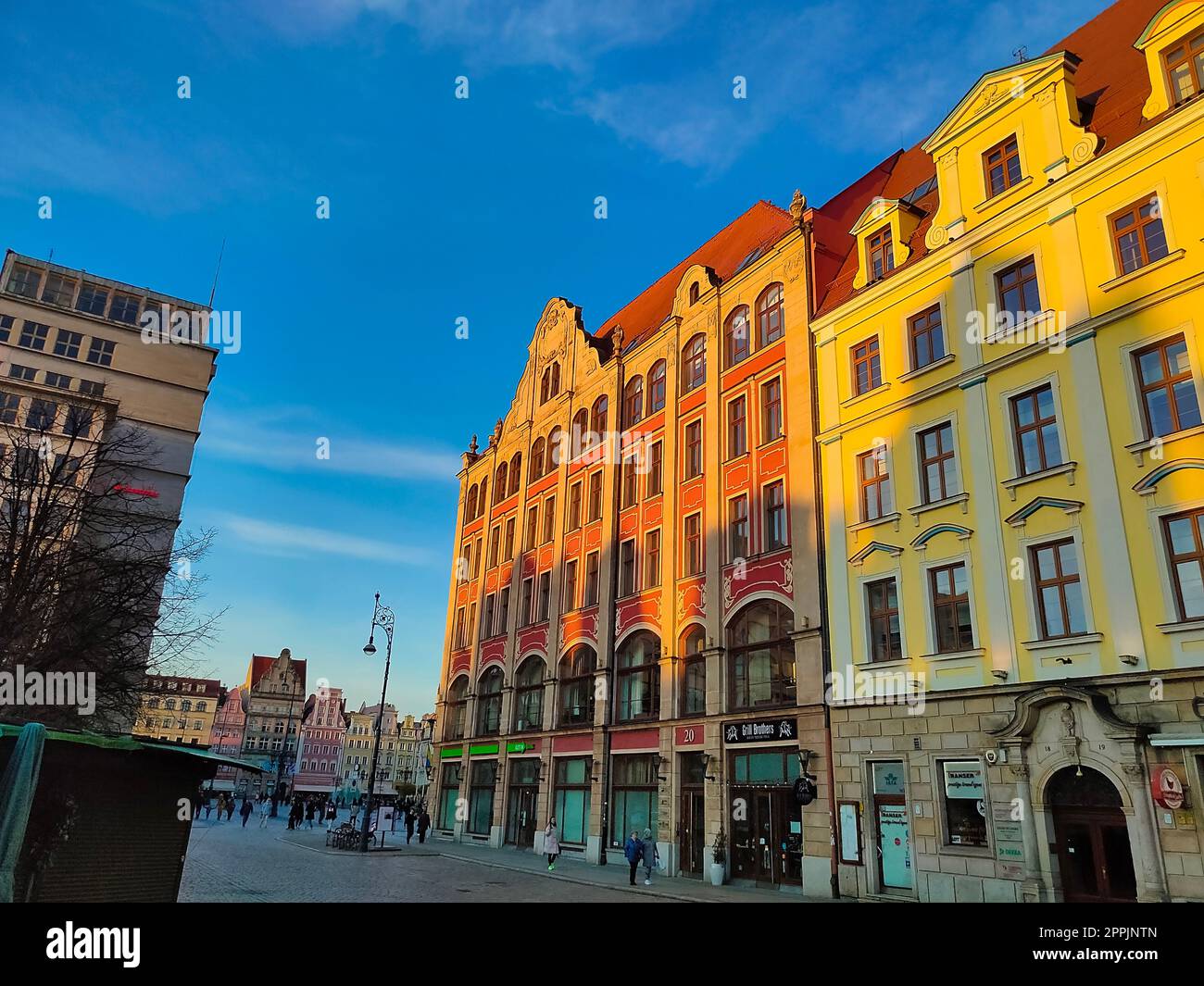 old town hall building with a clock in the center on Wroclaw Square ...