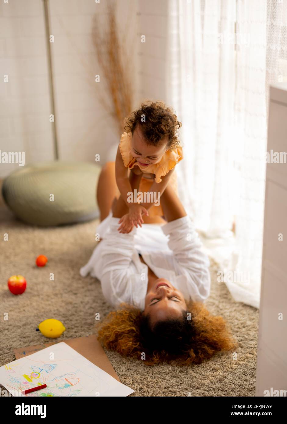 Parents teach children how to walk, hold objects, take turns, play ...