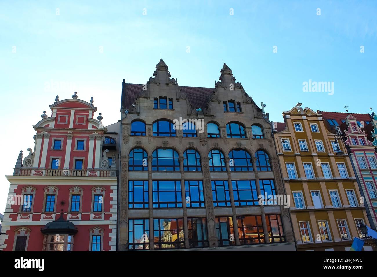 old town hall building with a clock in the center on Wroclaw Square ...