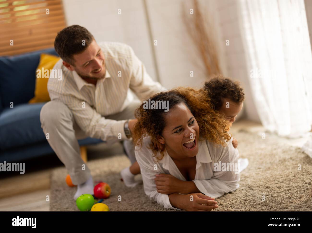 Parents teach children how to walk, hold objects, take turns, play ...