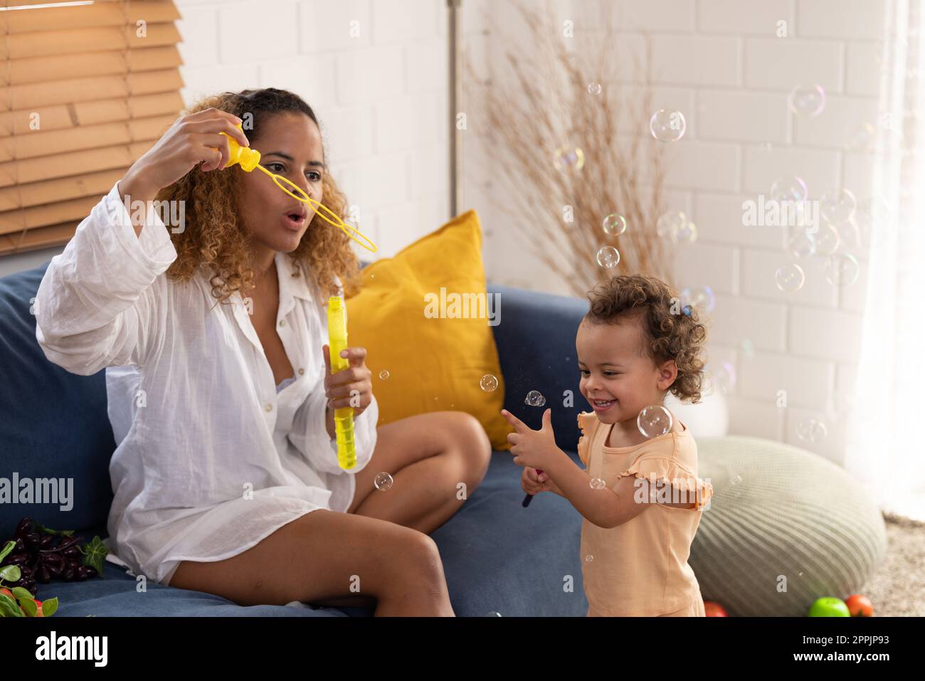 Parents teach children how to walk, hold objects, take turns, play ...