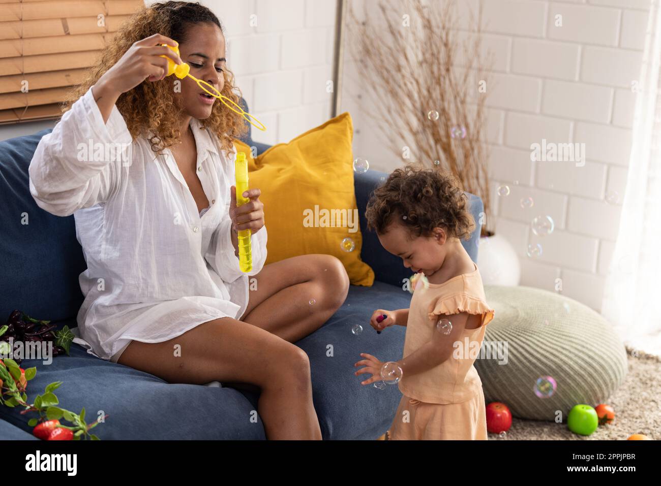 Parents teach children how to walk, hold objects, take turns, play ...