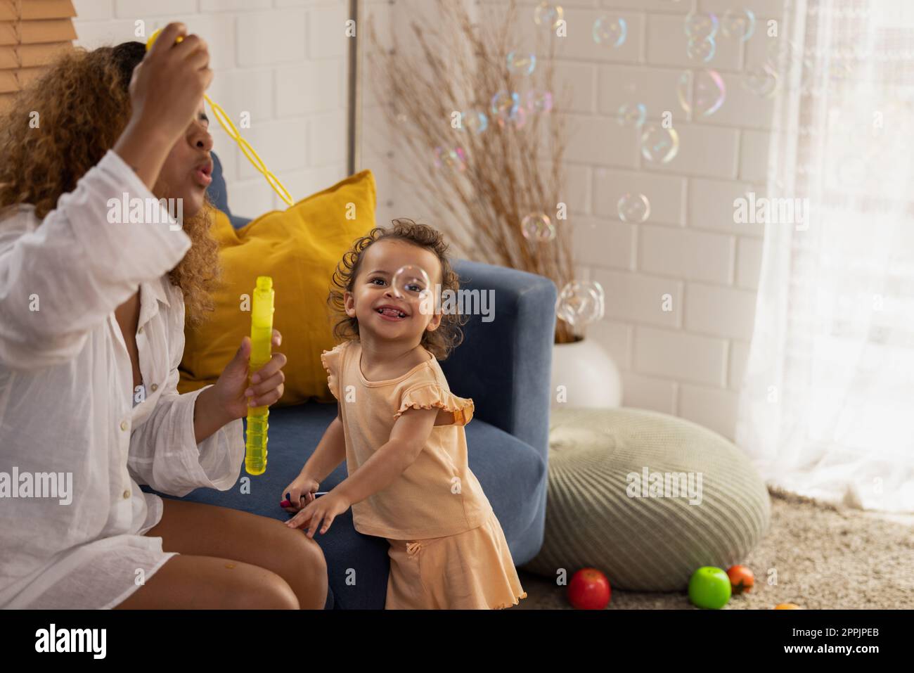 Parents teach children how to walk, hold objects, take turns, play ...