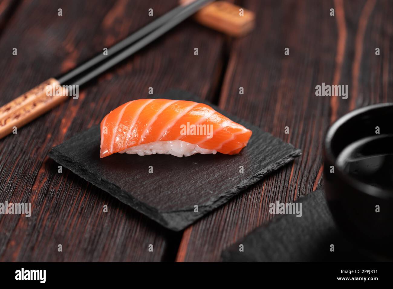 Japanese sushi food. Sushi nigiri with salmon close-up on stone natural ...