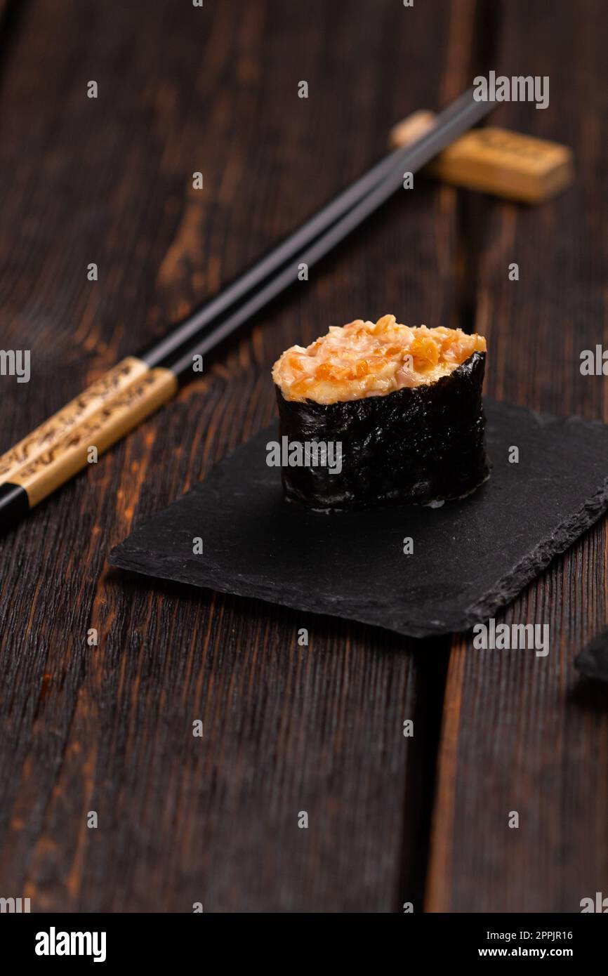 Gunkan Maki Sushi of fish salmon, scallop, perch, eel, shrimp and ...