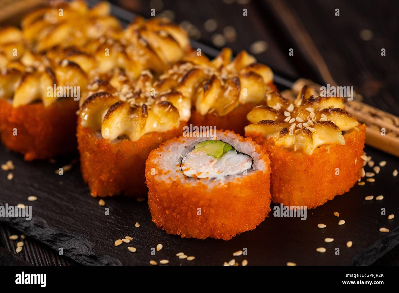 California sushi roll with crab, avocado and tobiko caviar served on ...