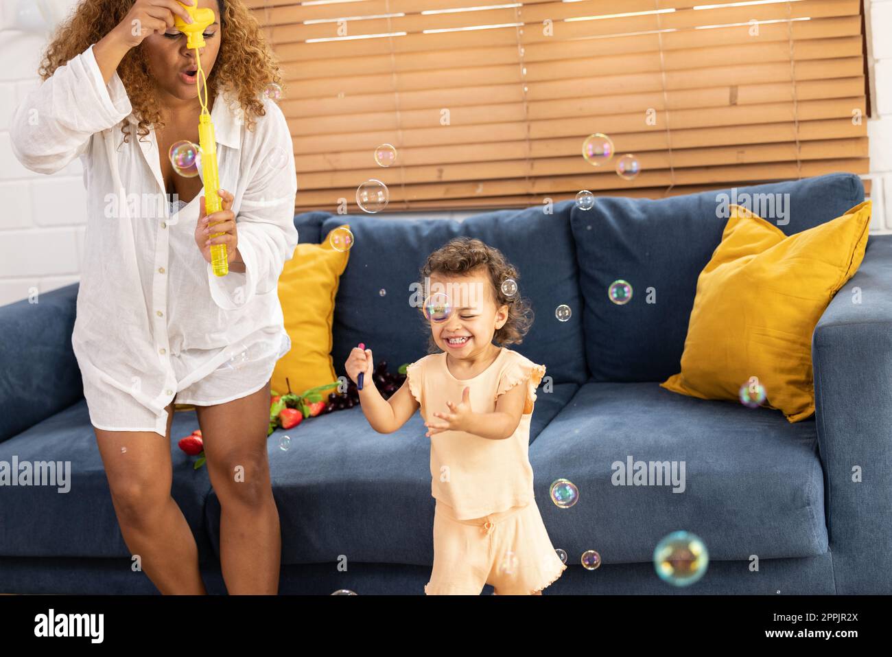 Parents teach children how to walk, hold objects, take turns, play ...