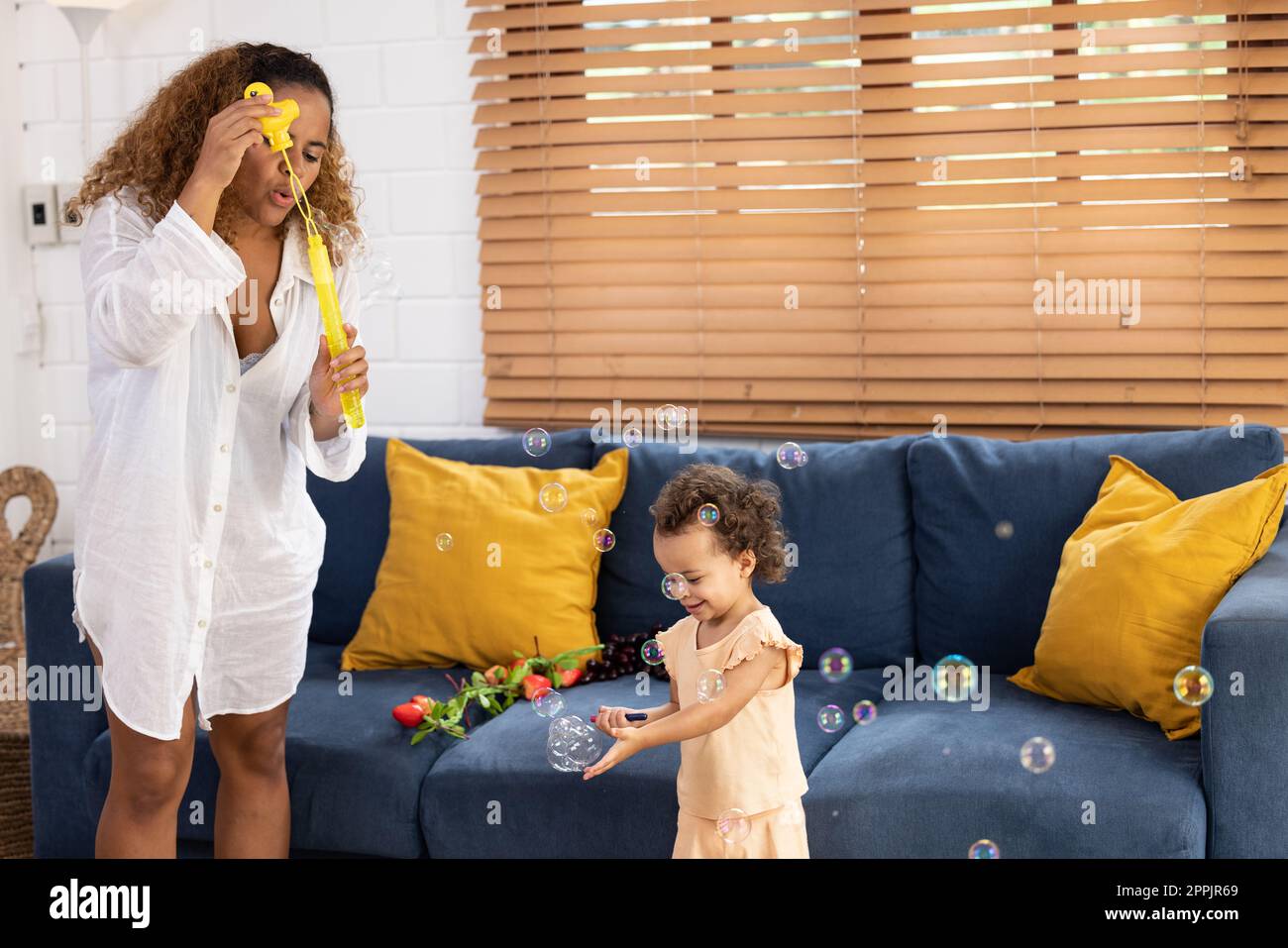 Parents teach children how to walk, hold objects, take turns, play ...