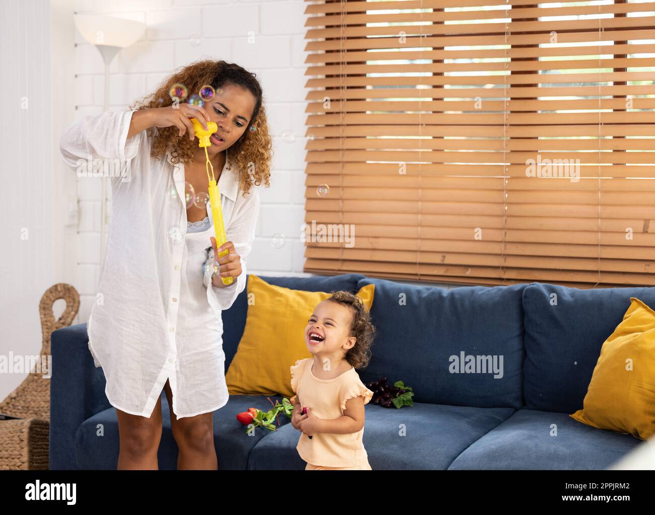 Parents teach children how to walk, hold objects, take turns, play ...